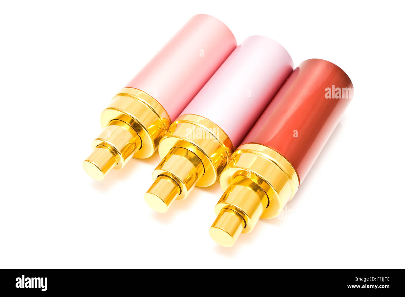 Three colorful horizontal spray cans isolated on white Stock Photo - Alamy