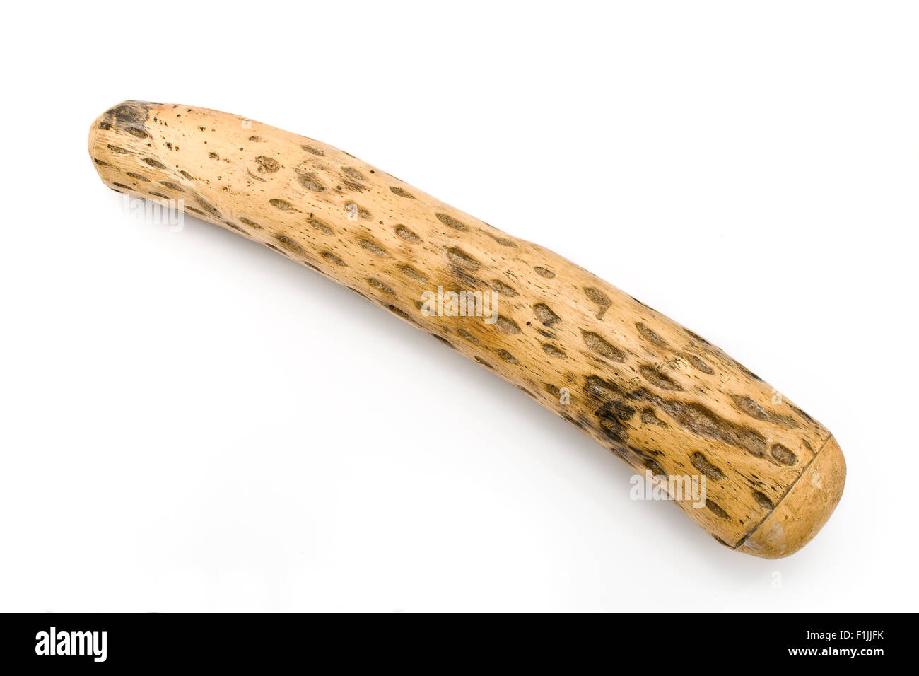 Rattle-shaker made of exotic wood isolated on white Stock Photo - Alamy