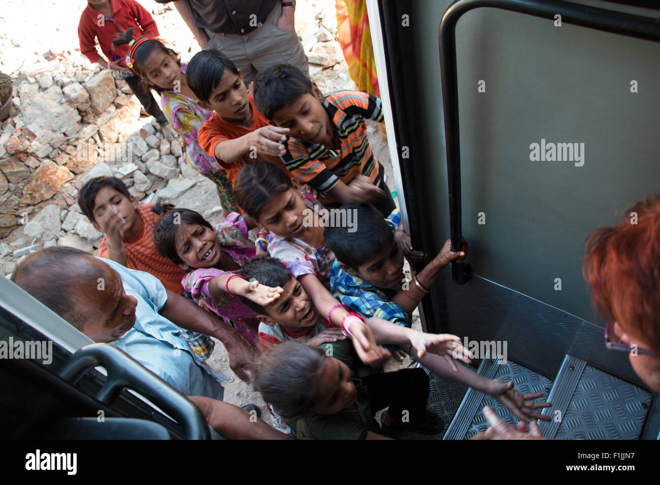 Poverty children begging hi-res stock photography and images - Alamy
