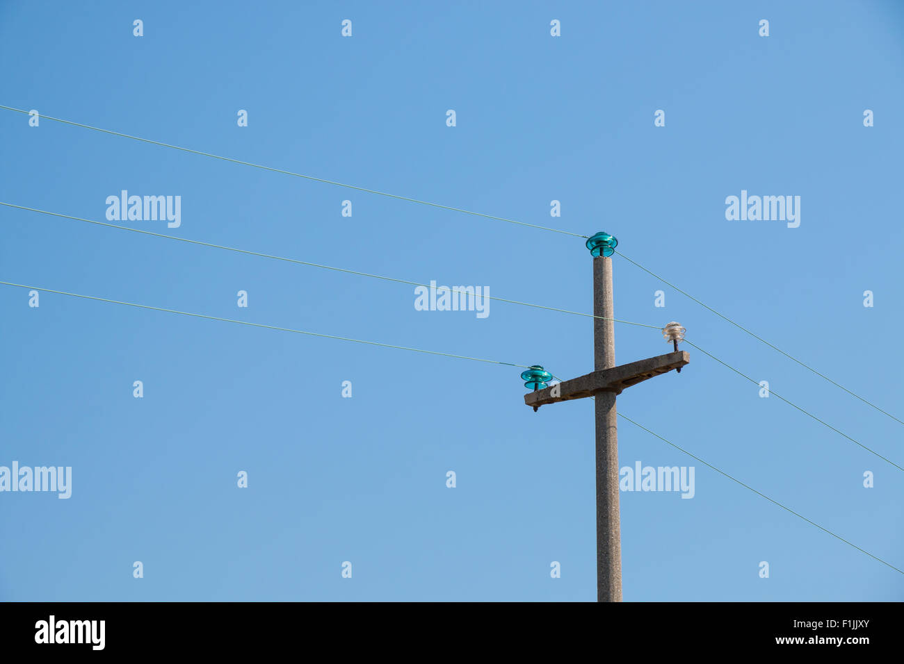 Power Pole made of cement concrete supporting a overhead power line ...