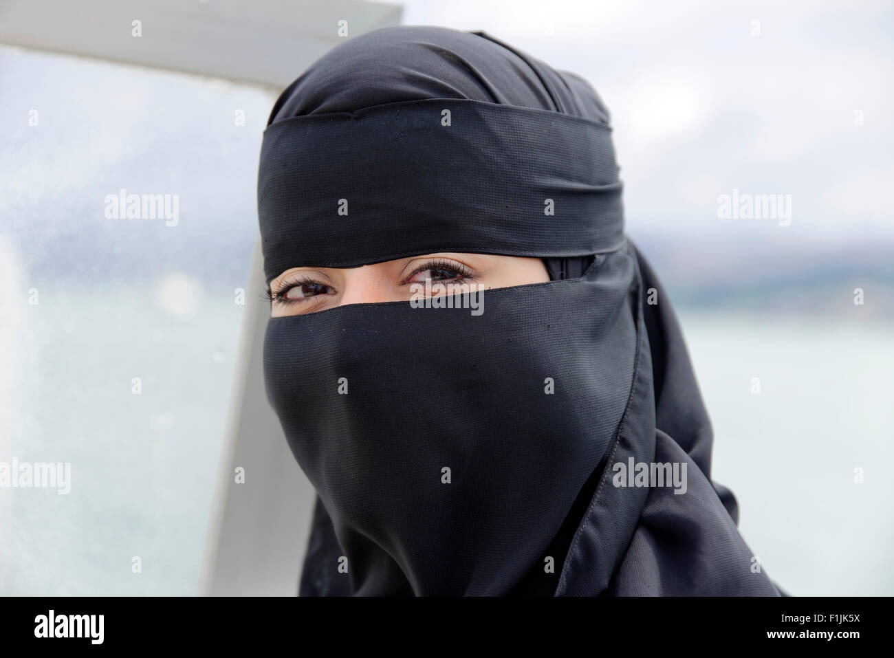 Veiled young muslim woman hi-res stock photography and images - Alamy