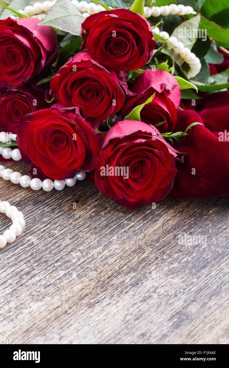 red roses on velvet Stock Photo - Alamy