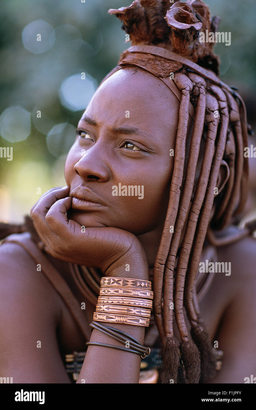 Woman in brown dress hi-res stock photography and images - Alamy