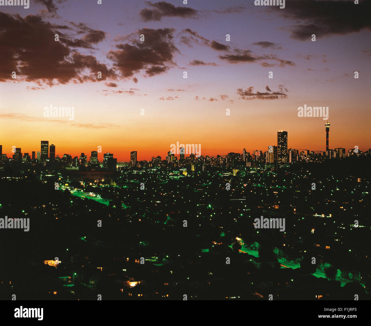 Silhouette of Johannesburg skyline with Hillbrow Tower at sunset ...