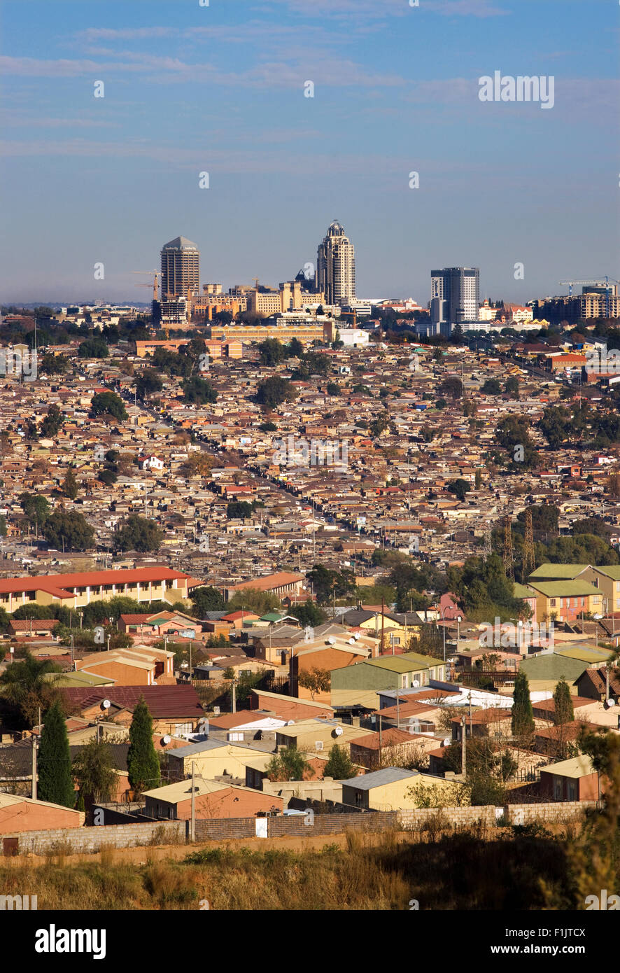 Alexandra township with Sandton skyline Stock Photo - Alamy