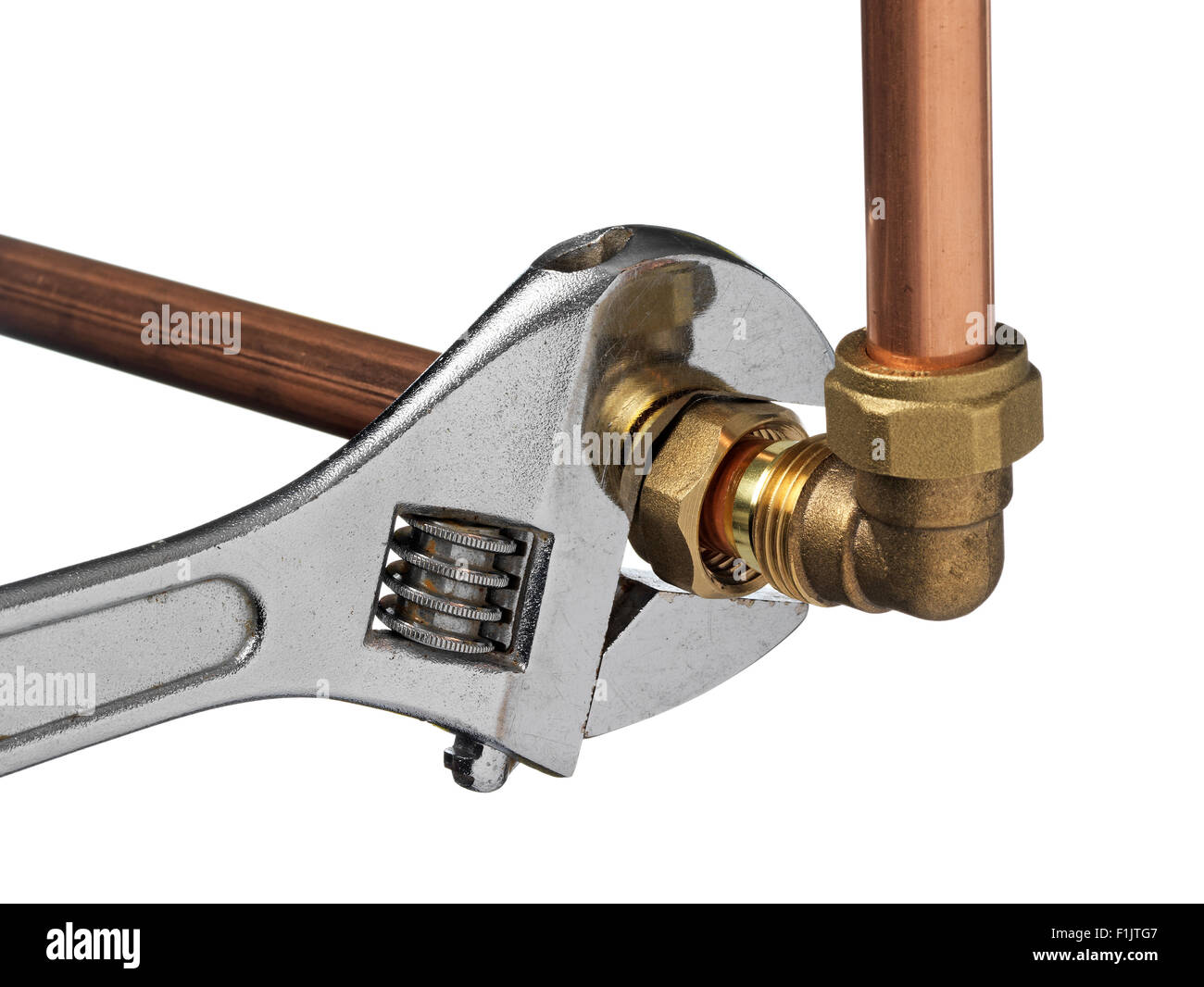Copper pipe and wrench Stock Photo - Alamy