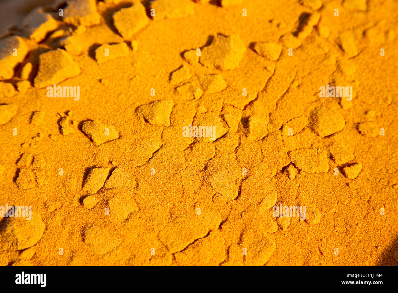 cracked sand in morocco africa desert abstract macro Stock Photo - Alamy