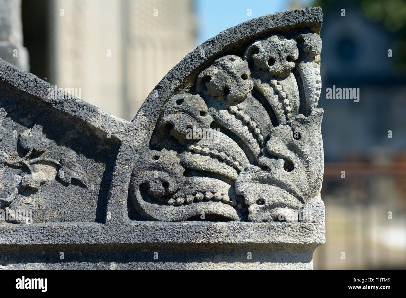 Flower carving on tomb in cemetery in Bordeaux France Stock Photo - Alamy