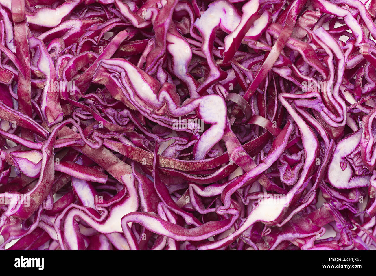 Purple cabbage slice closeup background Stock Photo - Alamy