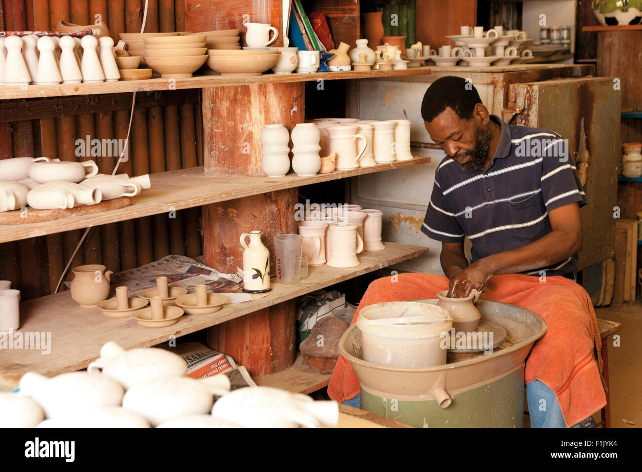 Potter in his studio Stock Photo - Alamy