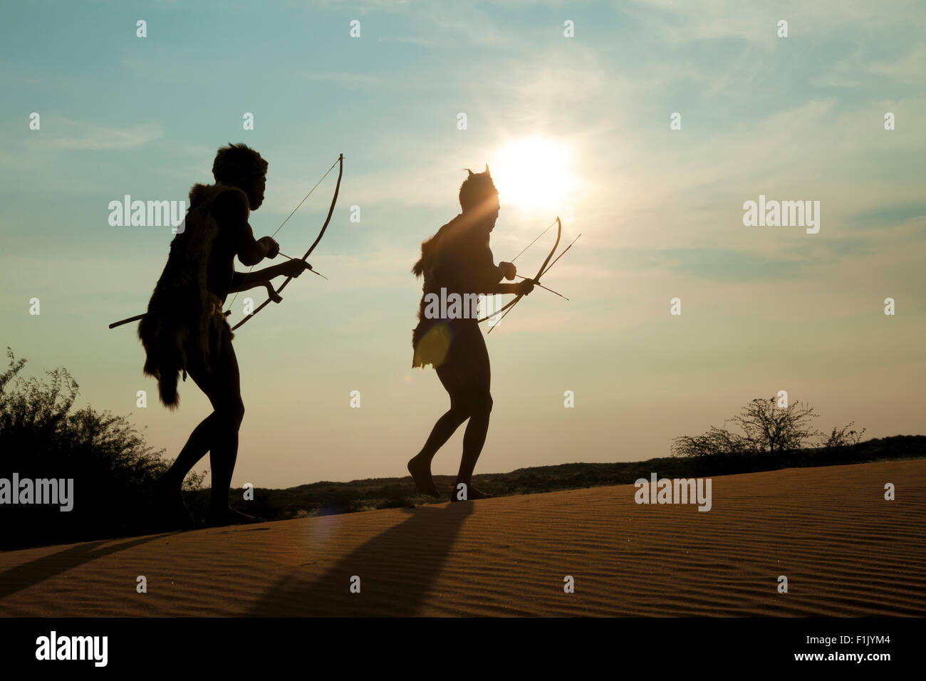 Bushmen tracking game Stock Photo - Alamy