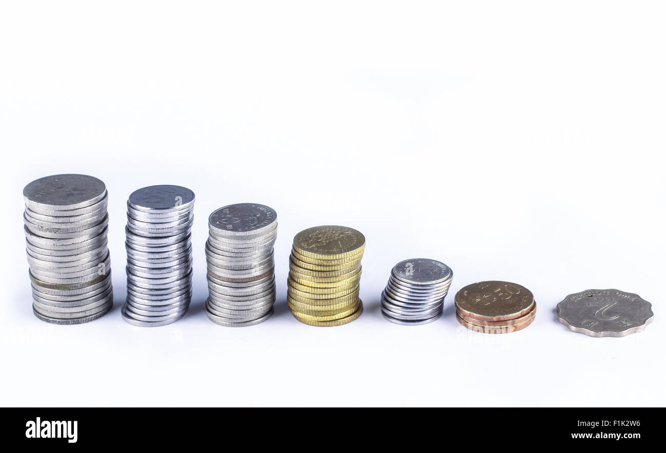 coins arranged in a state of decline isolated on white background Stock ...