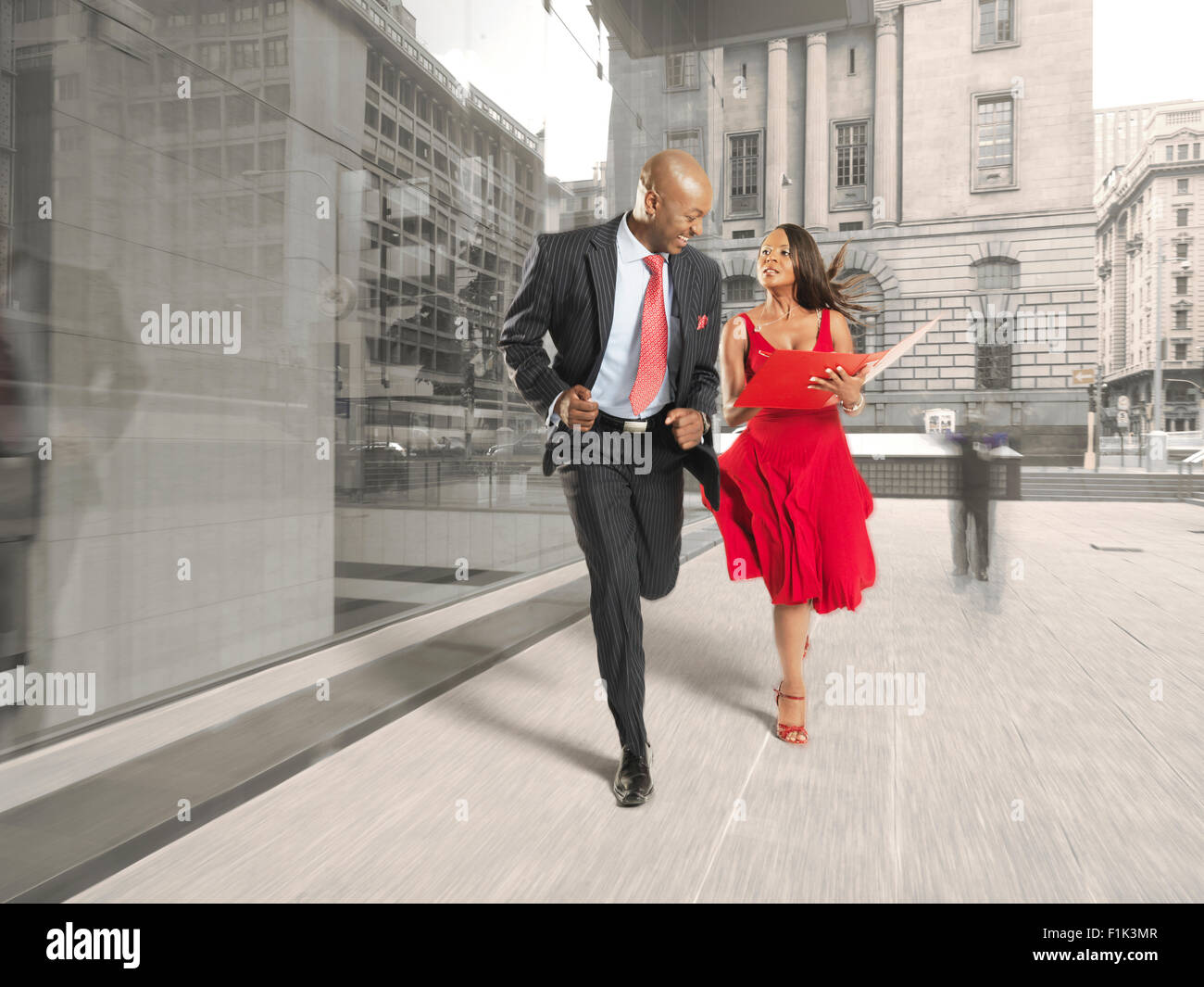 Business man and woman running running hi-res stock photography and ...