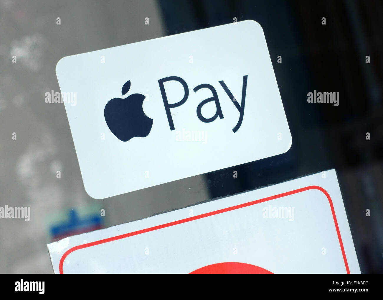 Apple Pay sign in restaurant window, London Stock Photo - Alamy