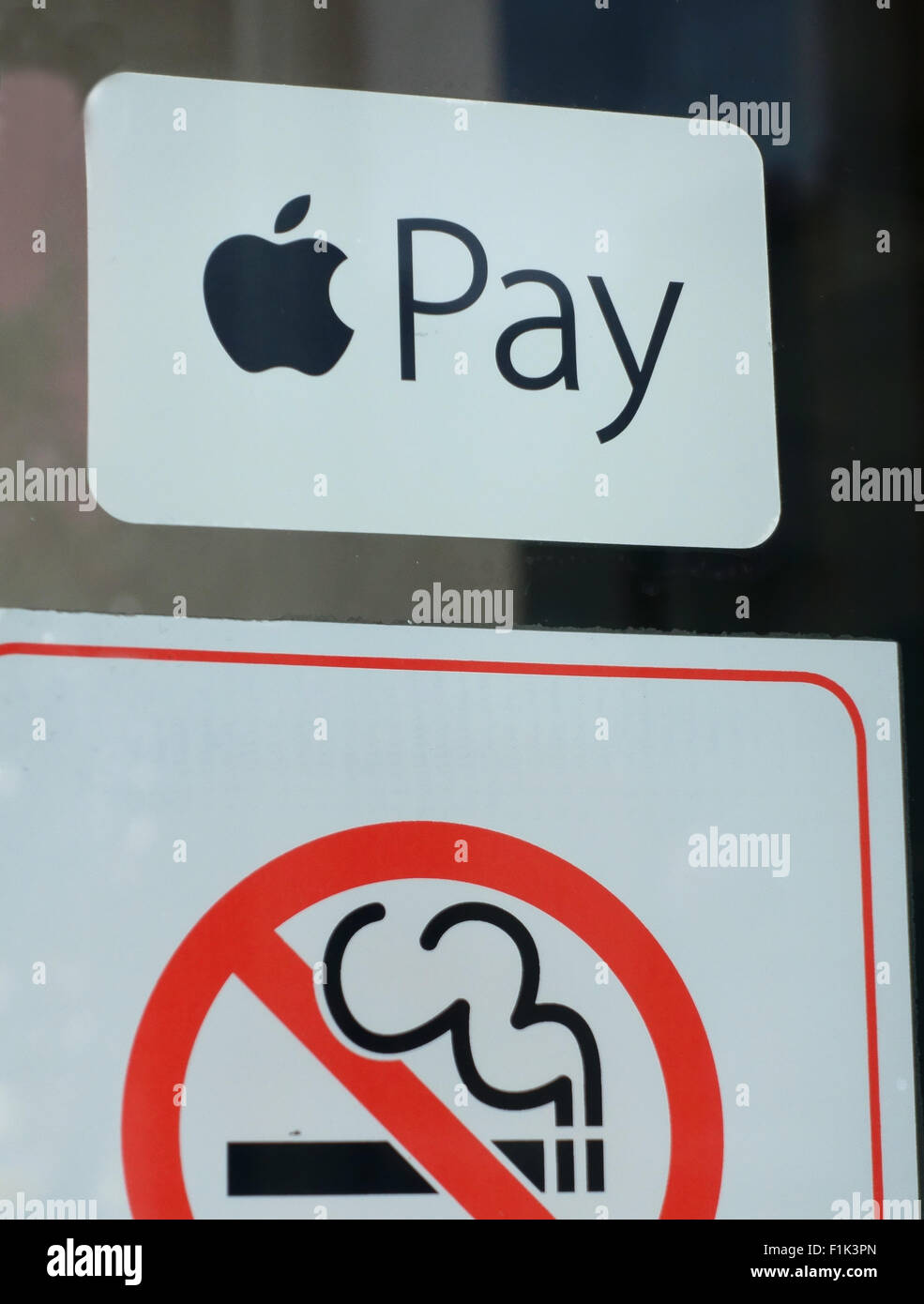 Apple Pay sign in restaurant window, London Stock Photo - Alamy