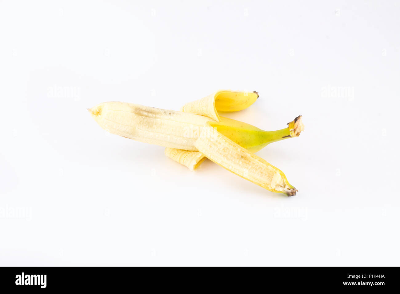 Open banana isolated on white background Stock Photo - Alamy