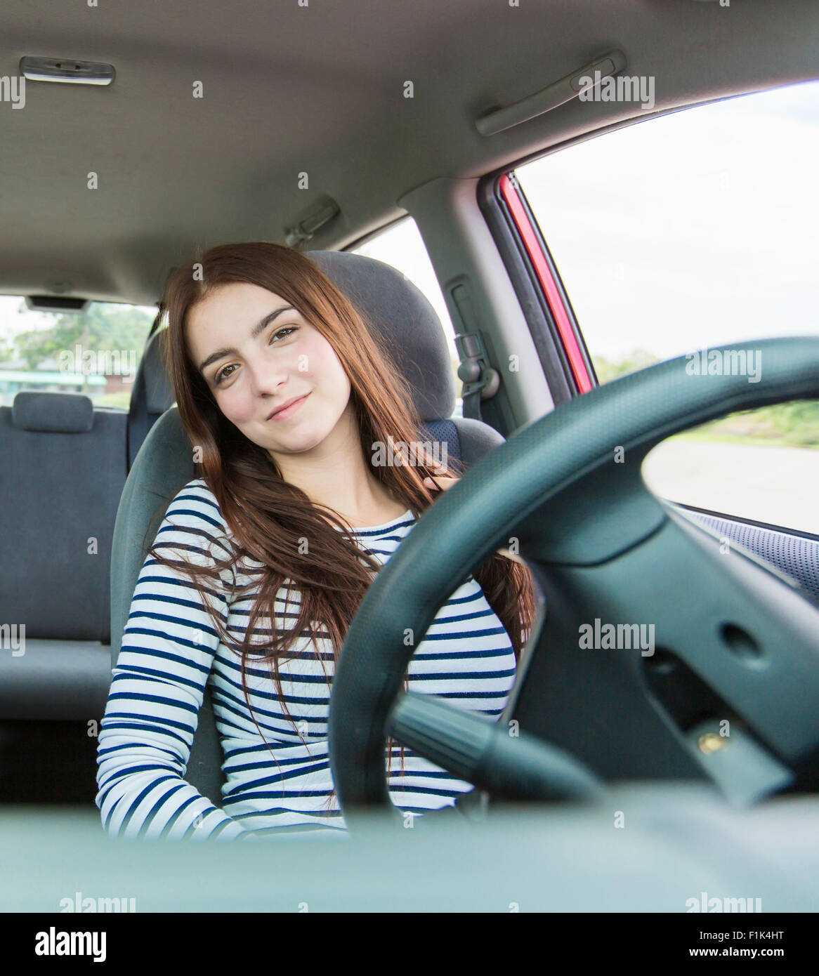 Woman driver outside Stock Photo - Alamy