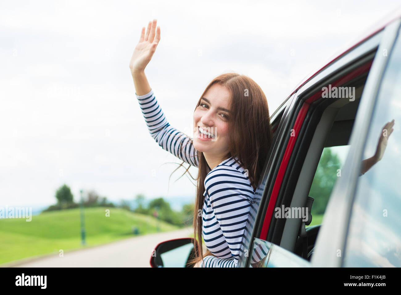 Woman driver outside Stock Photo - Alamy