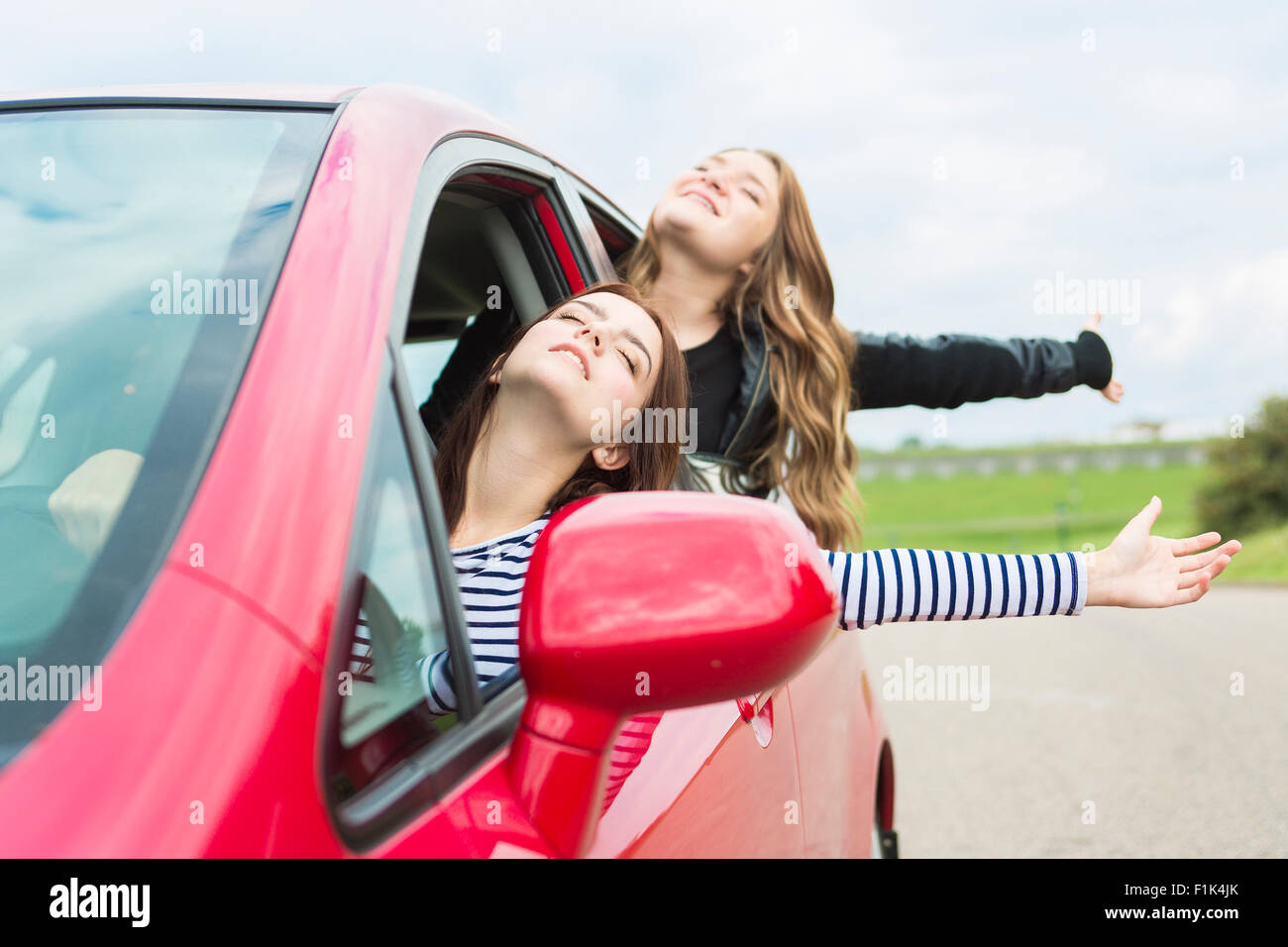 Woman driver outside Stock Photo - Alamy