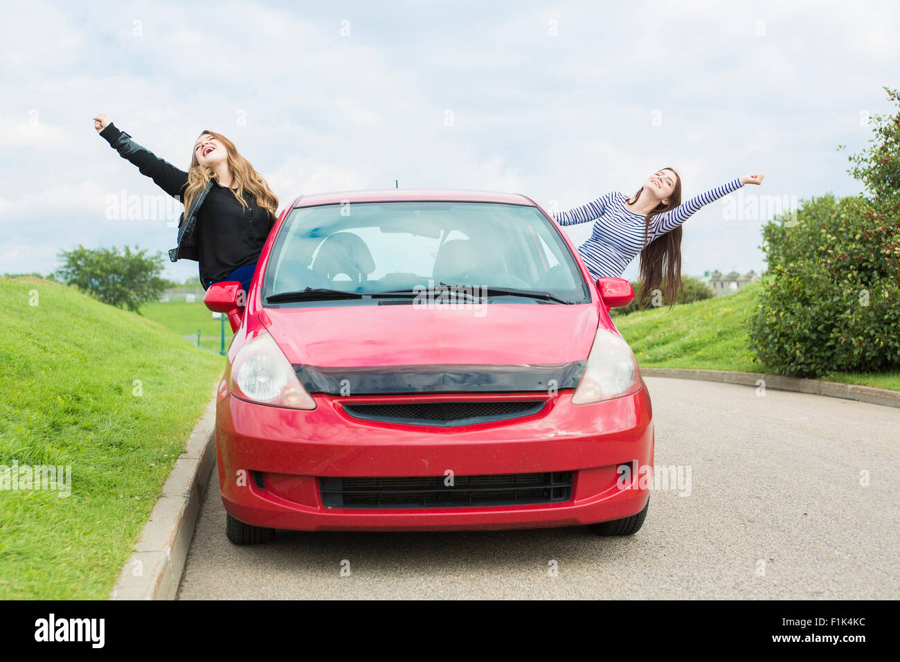 Woman driver outside Stock Photo - Alamy