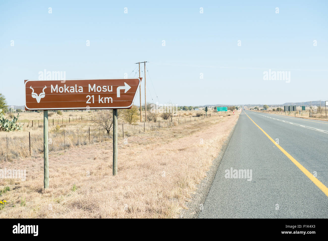 Road sign next to the N12 road near Modderrivier giving directions to ...