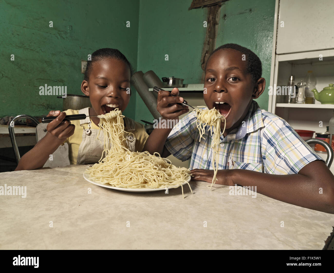 Africa eating noodles hi-res stock photography and images - Alamy