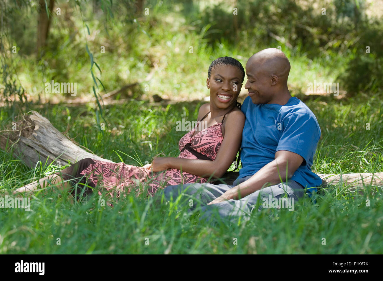 Couple relaxing in nature Stock Photo - Alamy