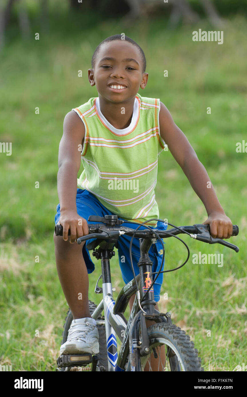 Boy on bicycle Stock Photo - Alamy