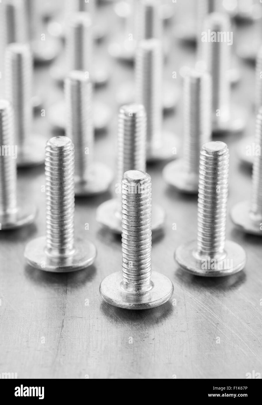 bolts tool at metal background texture Stock Photo - Alamy