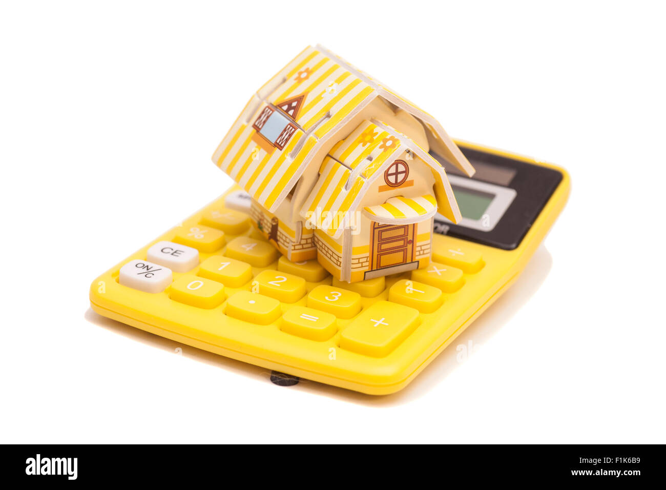 house and calculator Stock Photo - Alamy