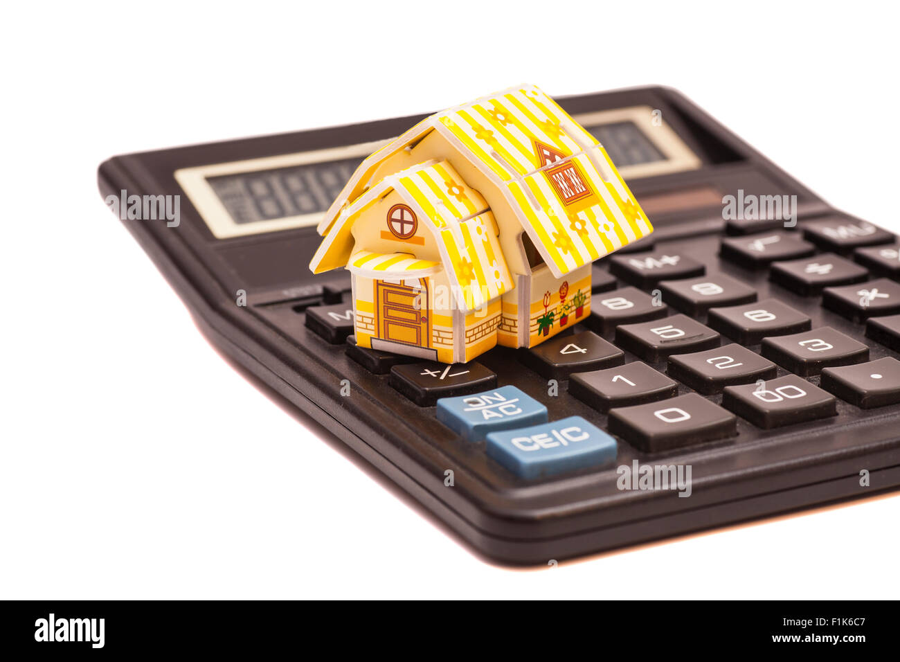 house and calculator Stock Photo - Alamy