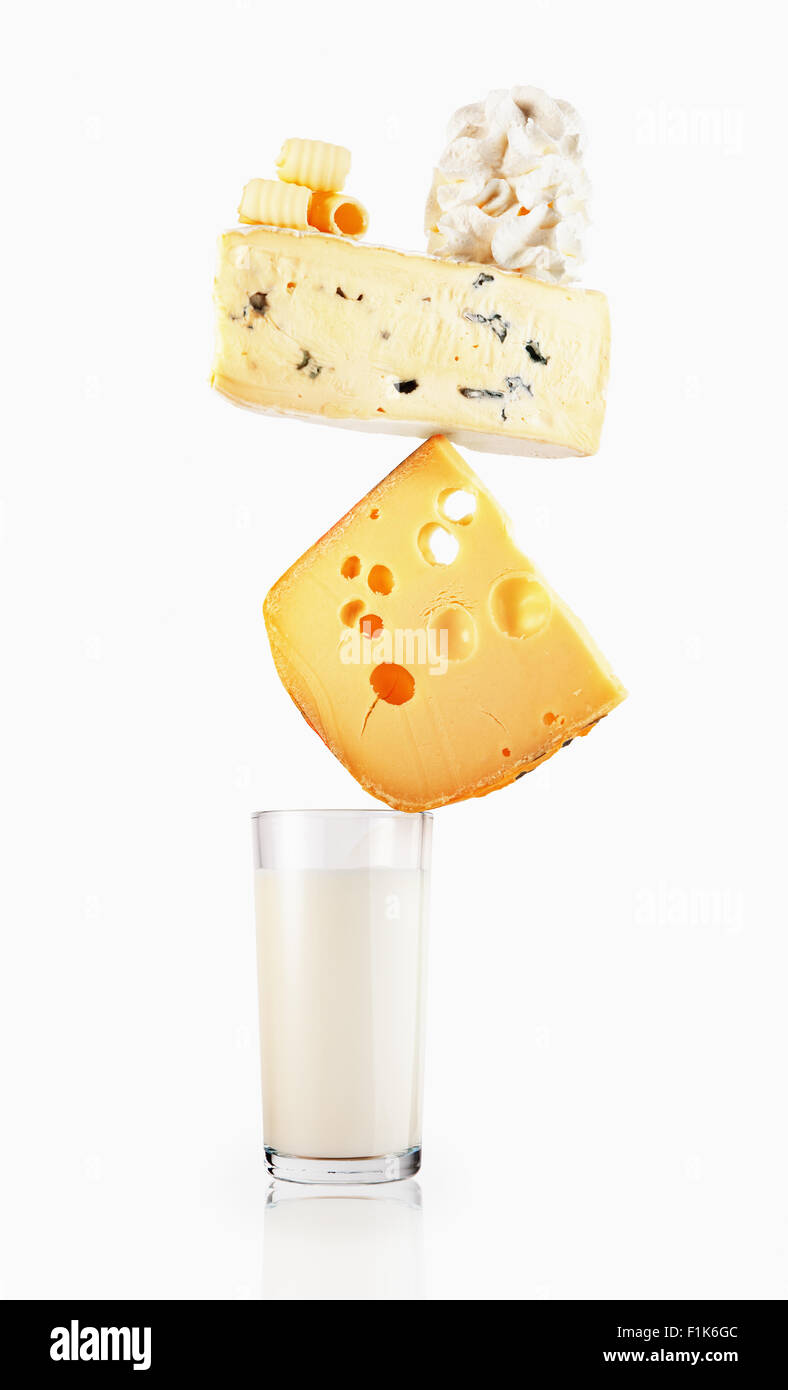 Milk and cheese balancing Stock Photo - Alamy