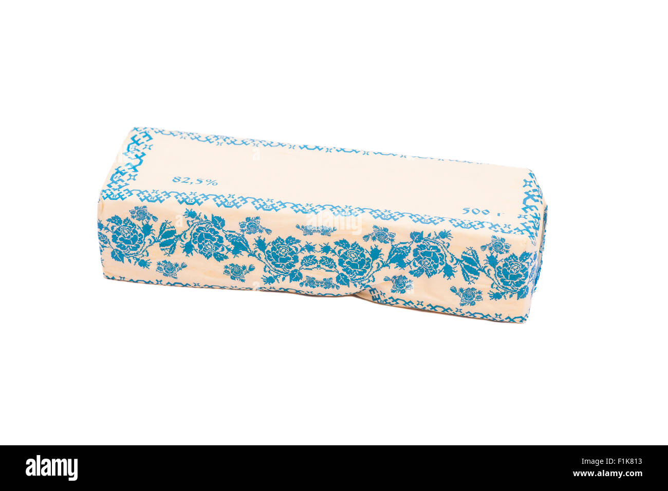 Stick of wrapped butter on white background Stock Photo - Alamy