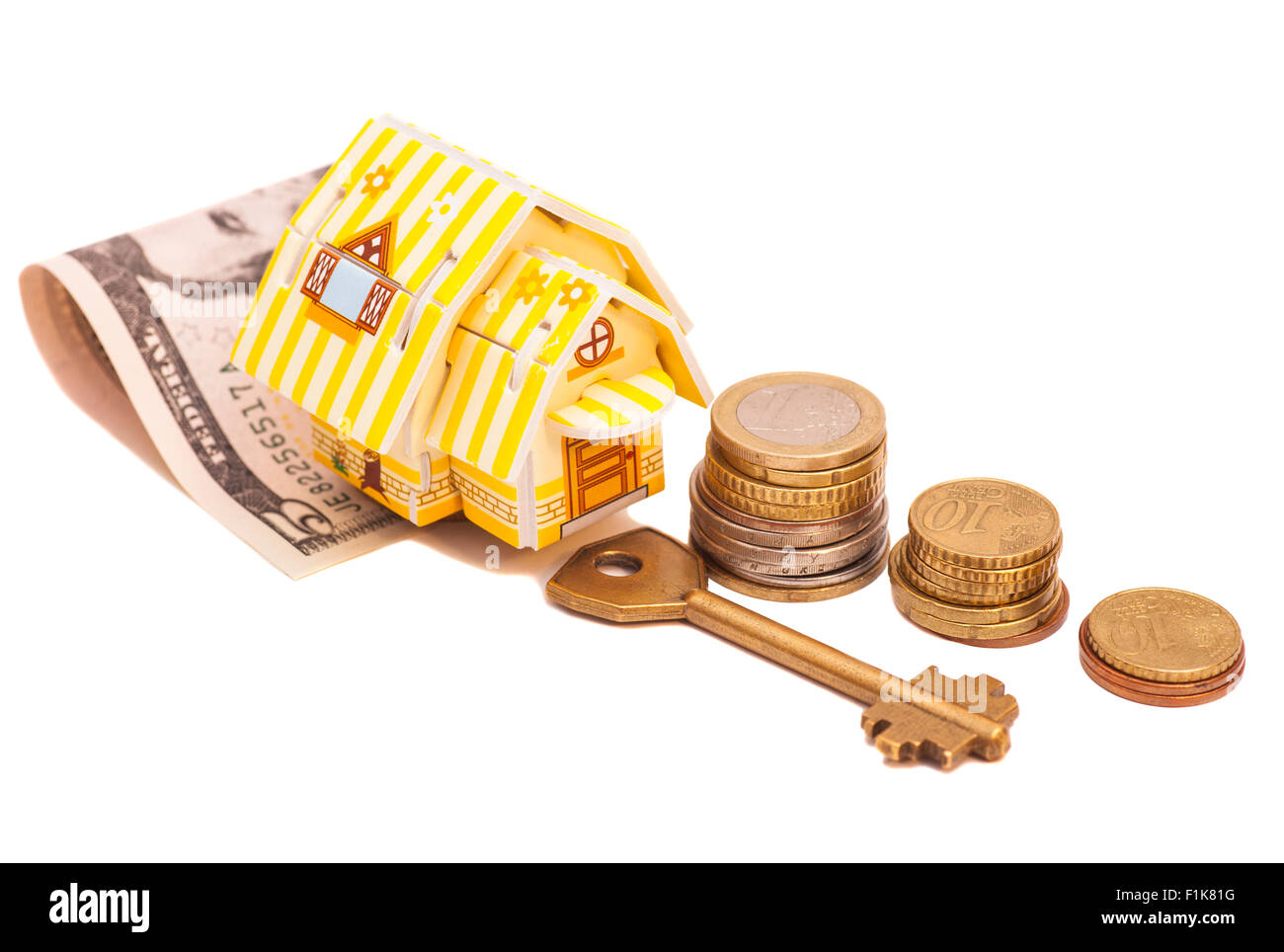 House with money and key Stock Photo - Alamy