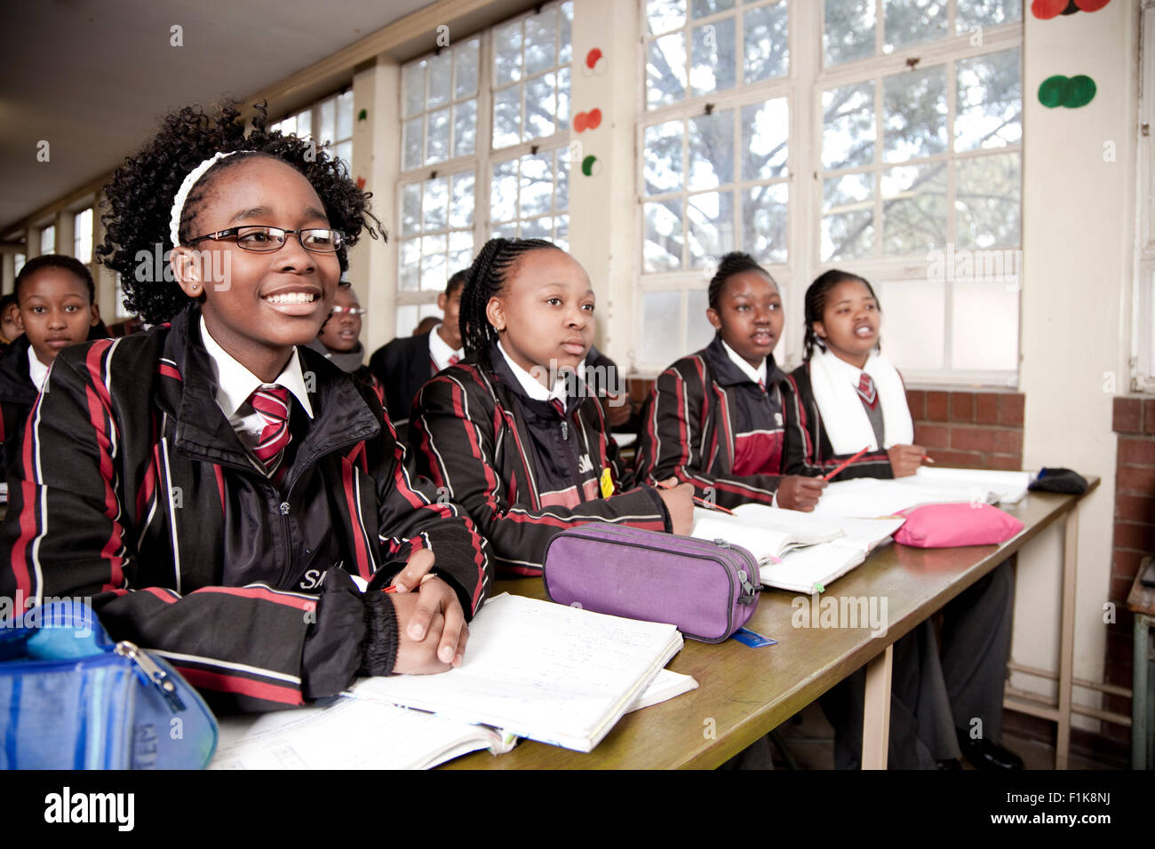 An overall shot of Female students sitting in front of the class ...