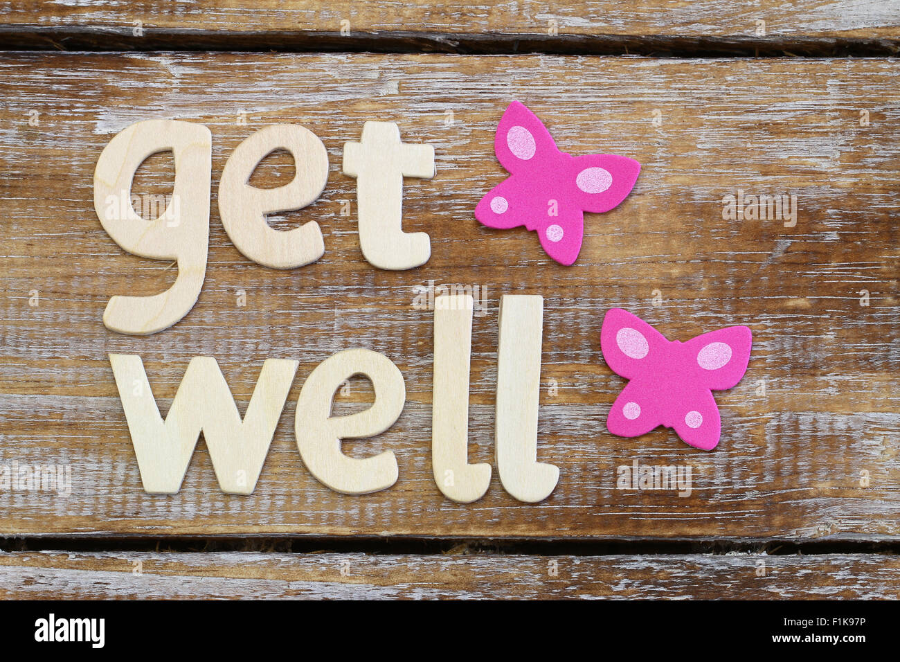 Get well written with wooden letters on rustic wooden surface Stock ...