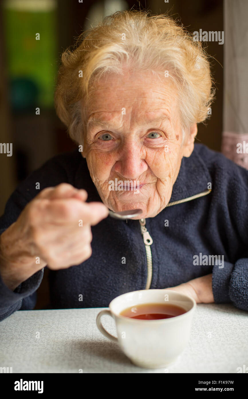 Mature woman and adult daughter and tea hi-res stock photography and ...