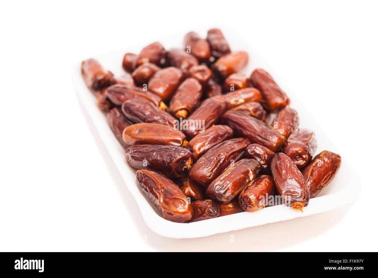 fresh dates fruits isolated on white Stock Photo - Alamy