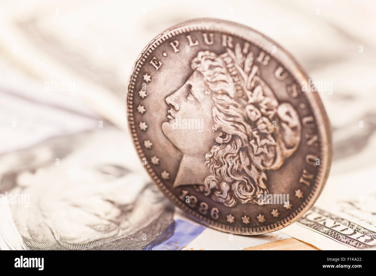 US dollar bills and coin Stock Photo - Alamy