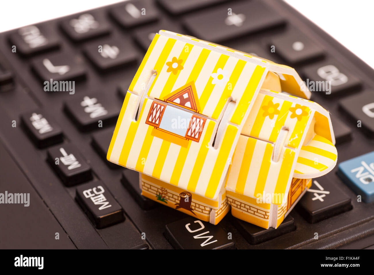 house and calculator Stock Photo - Alamy