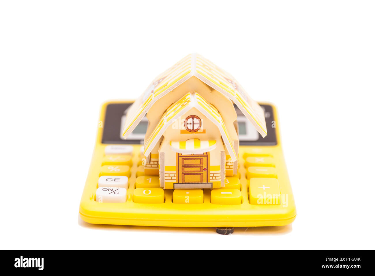 Calculator house model Cut Out Stock Images & Pictures - Alamy