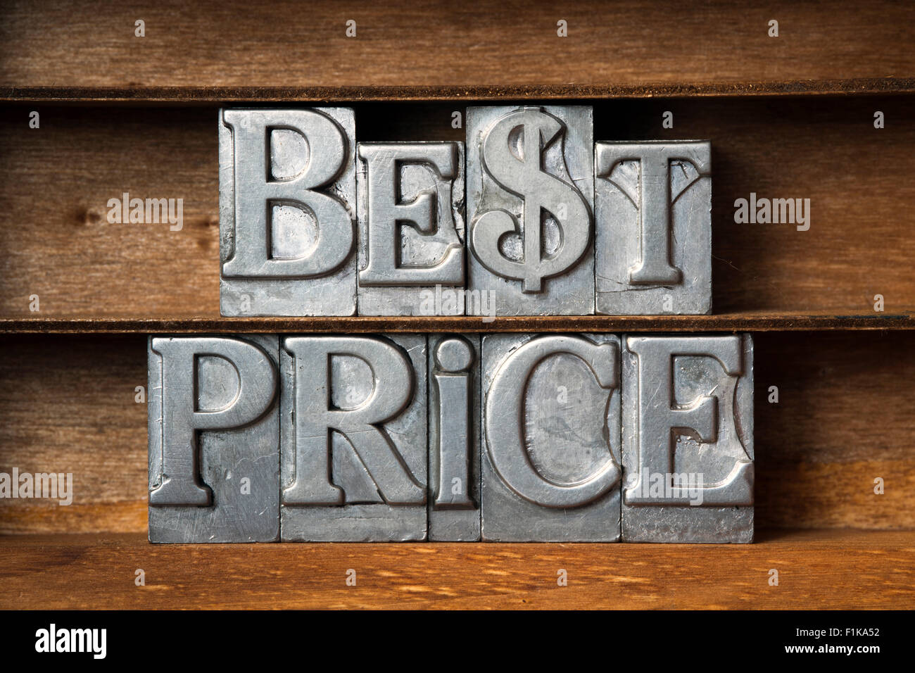 best price phrase with dollar sign made from metallic letterpress type ...