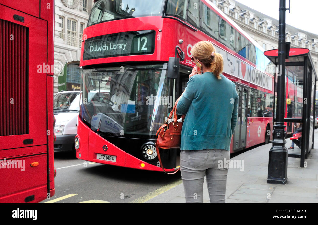 Busstop woman hi-res stock photography and images - Alamy
