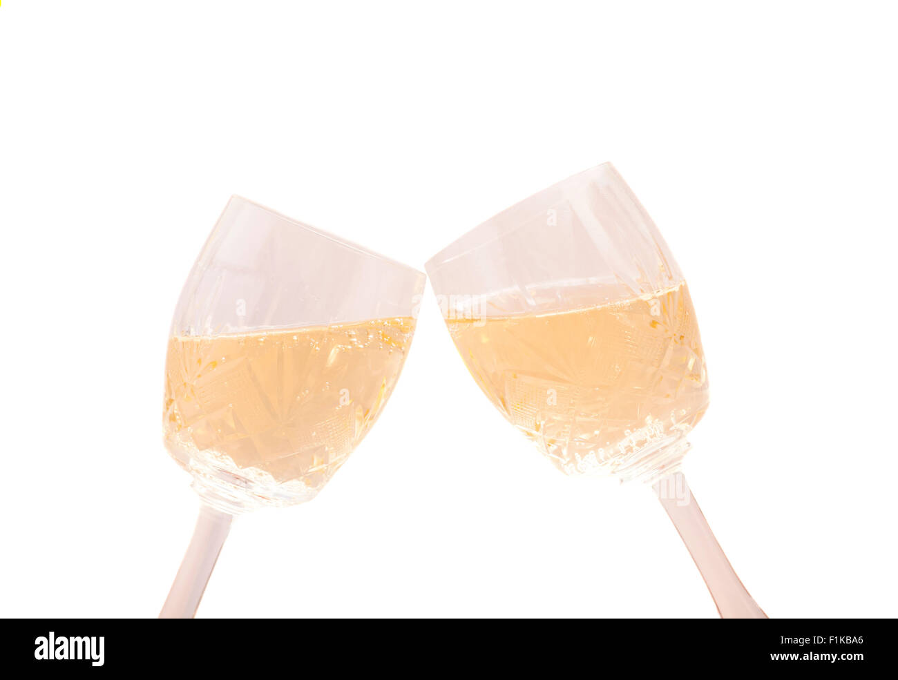 Two champagne glasses. Isolated on white background Stock Photo - Alamy