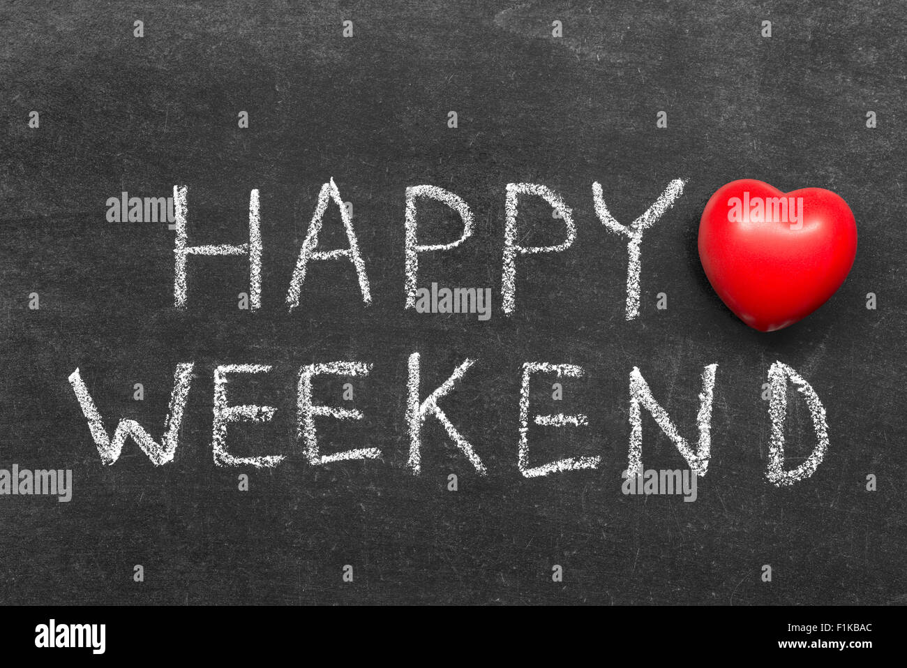 happy weekend phrase handwritten on blackboard with heart symbol Stock ...