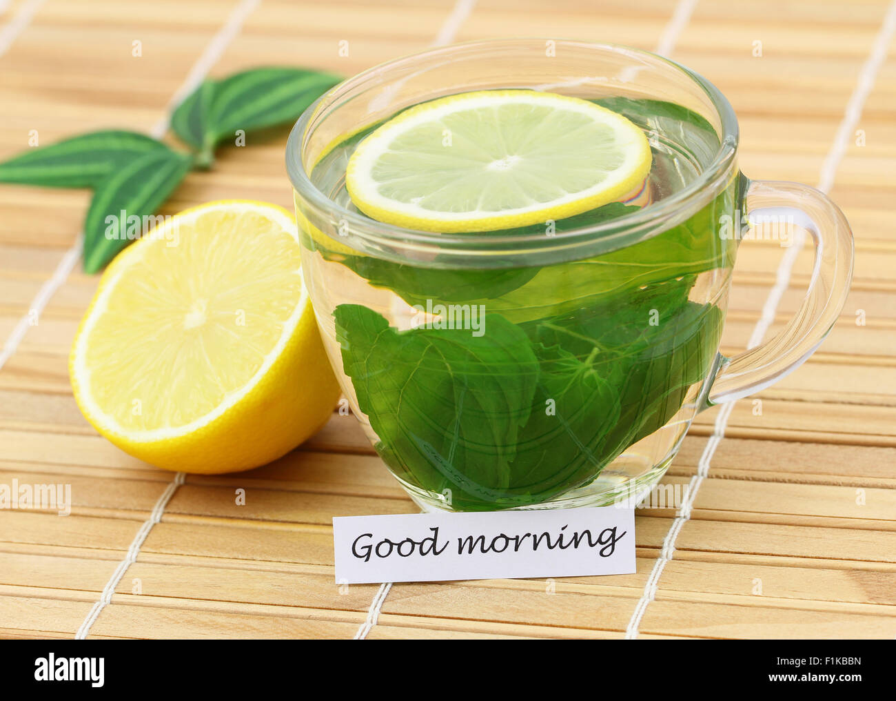 Good morning card with mint tea and lemon Stock Photo - Alamy