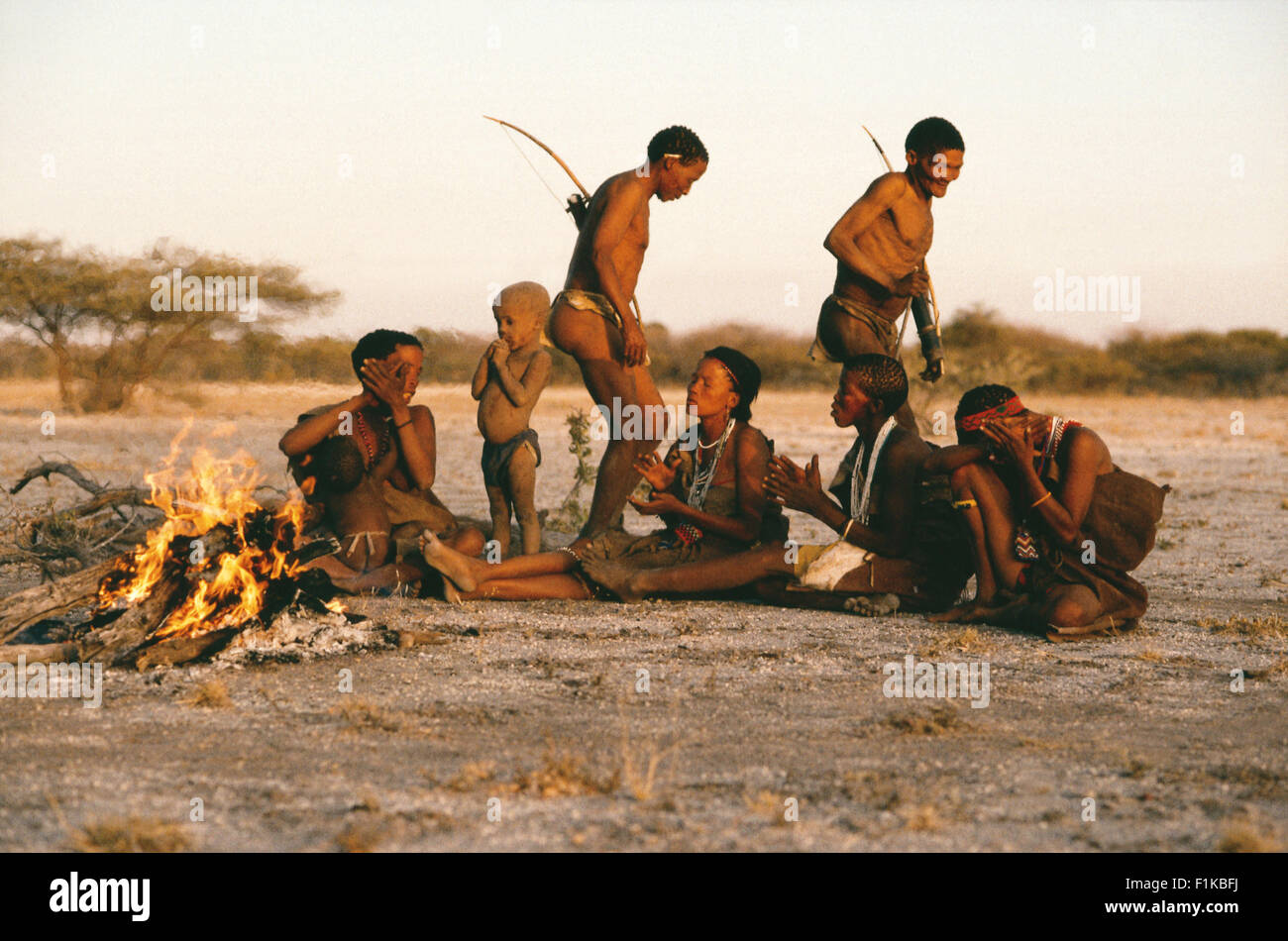 Bushman tribe around fire. Botswana, Africa Stock Photo - Alamy