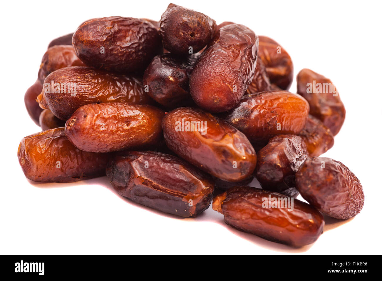 Dates isolated on white background Stock Photo - Alamy
