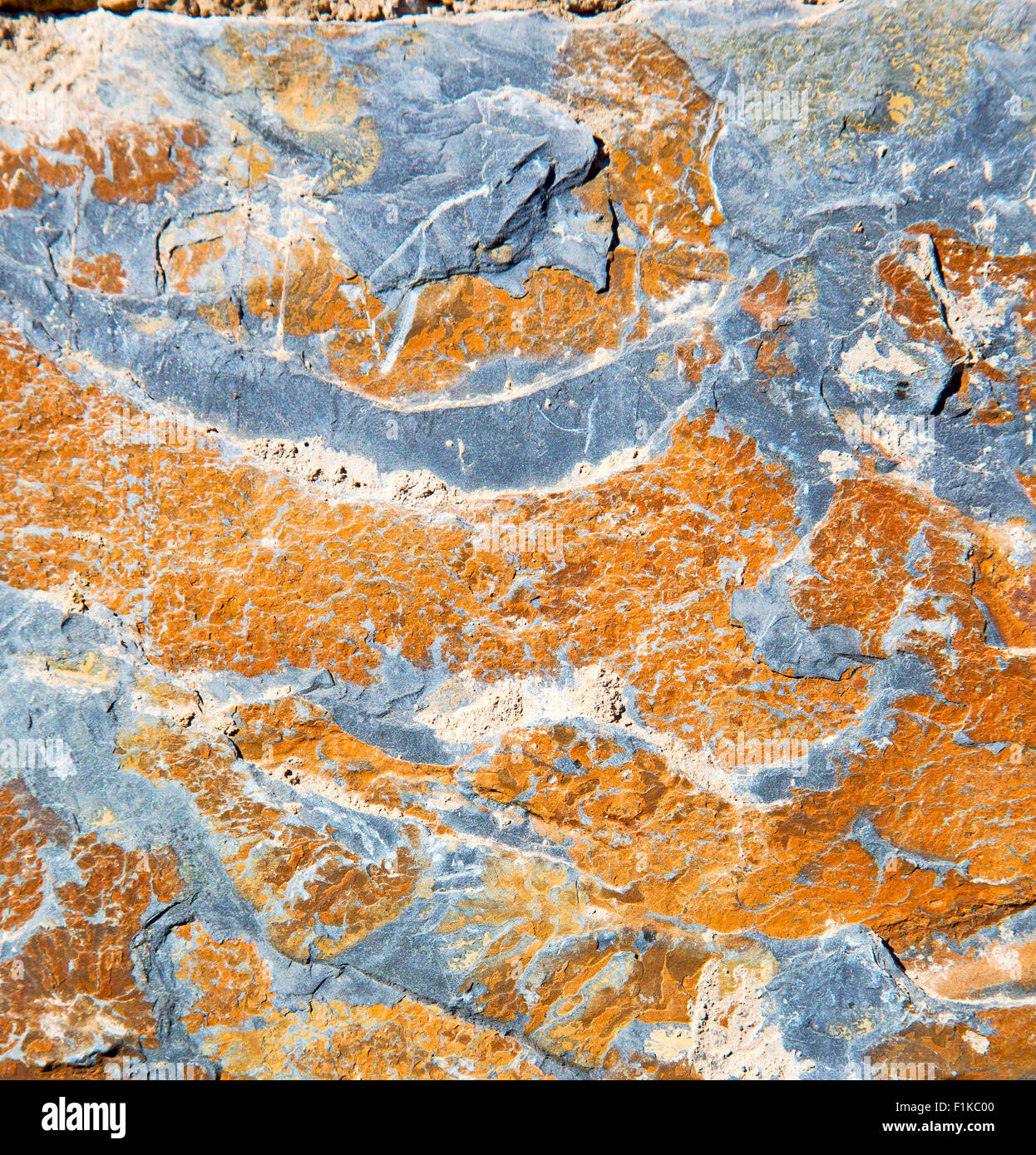 rocks stone and red orange gneiss in the wall of morocco Stock Photo ...