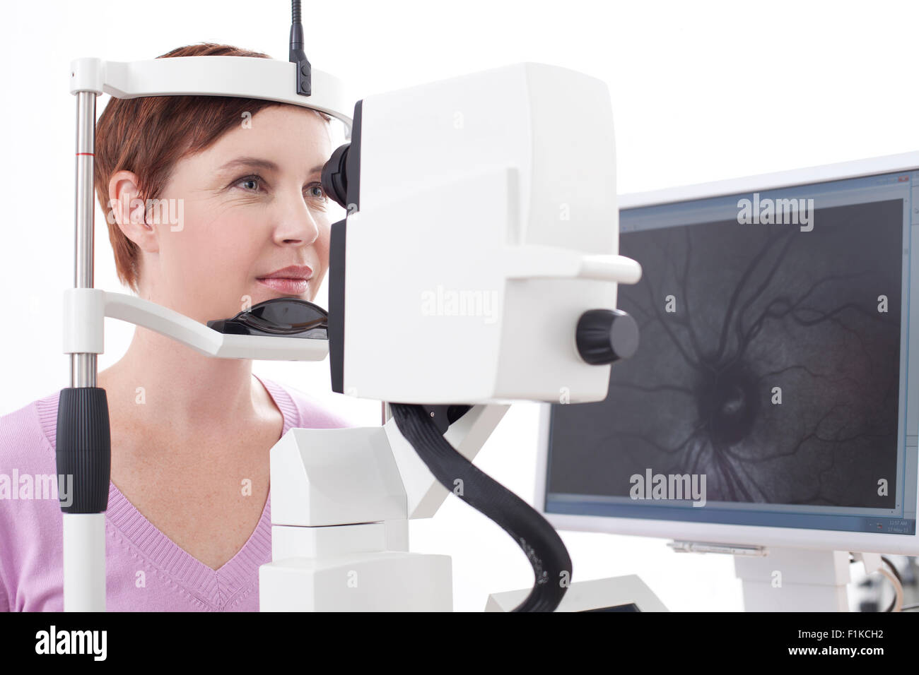Woman getting her eyes tested Stock Photo - Alamy